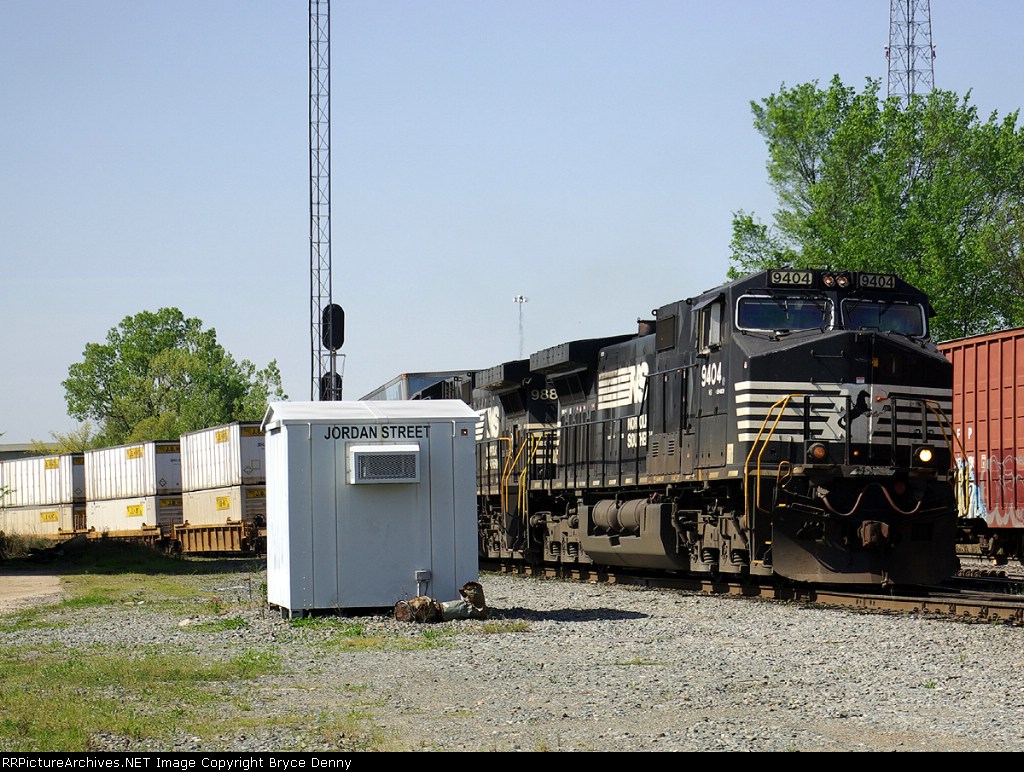 NS 9404 and 9883 leading double stack towards the Meridian Speedway